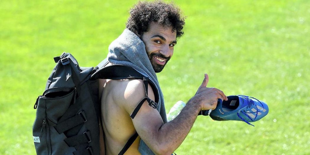 Big smiles and a thumbs up from Mohamed Salah as Liverpool return after ...